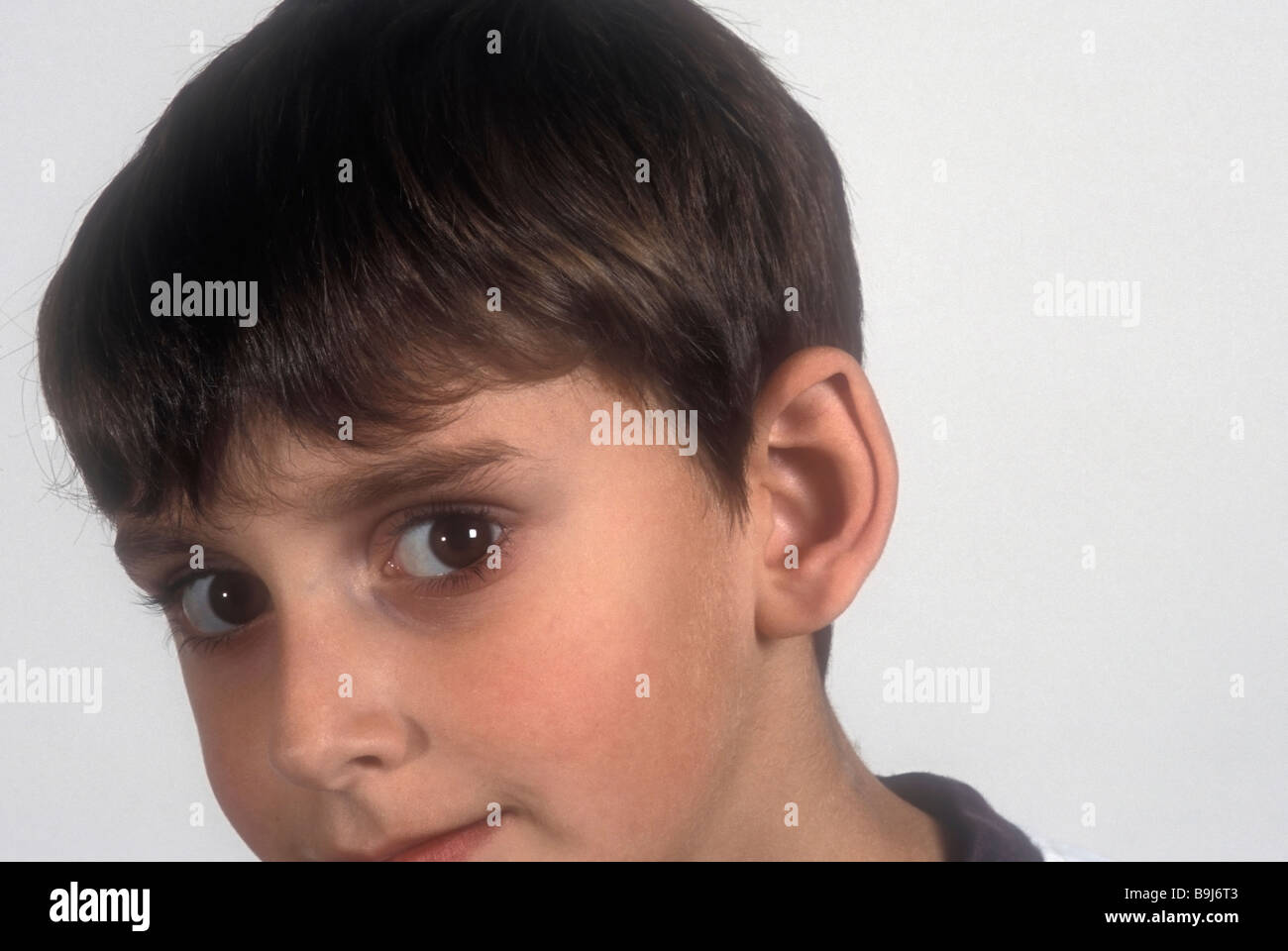 Mischievous Look on Boy's Face Stock Photo - Alamy