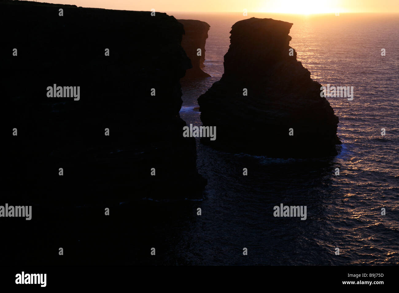 cliffs of Kilkee at sunset, Ireland Stock Photo - Alamy
