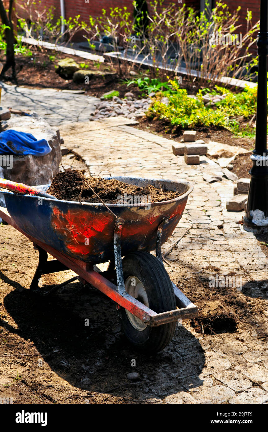 Landscaping and paving work in progress at a front yard of a house ...