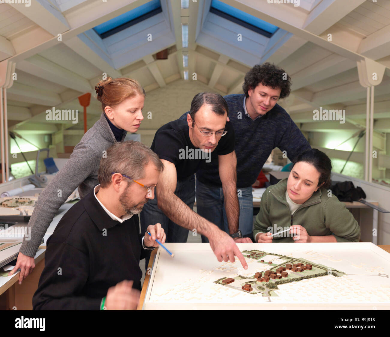 Architects discussing project Stock Photo - Alamy