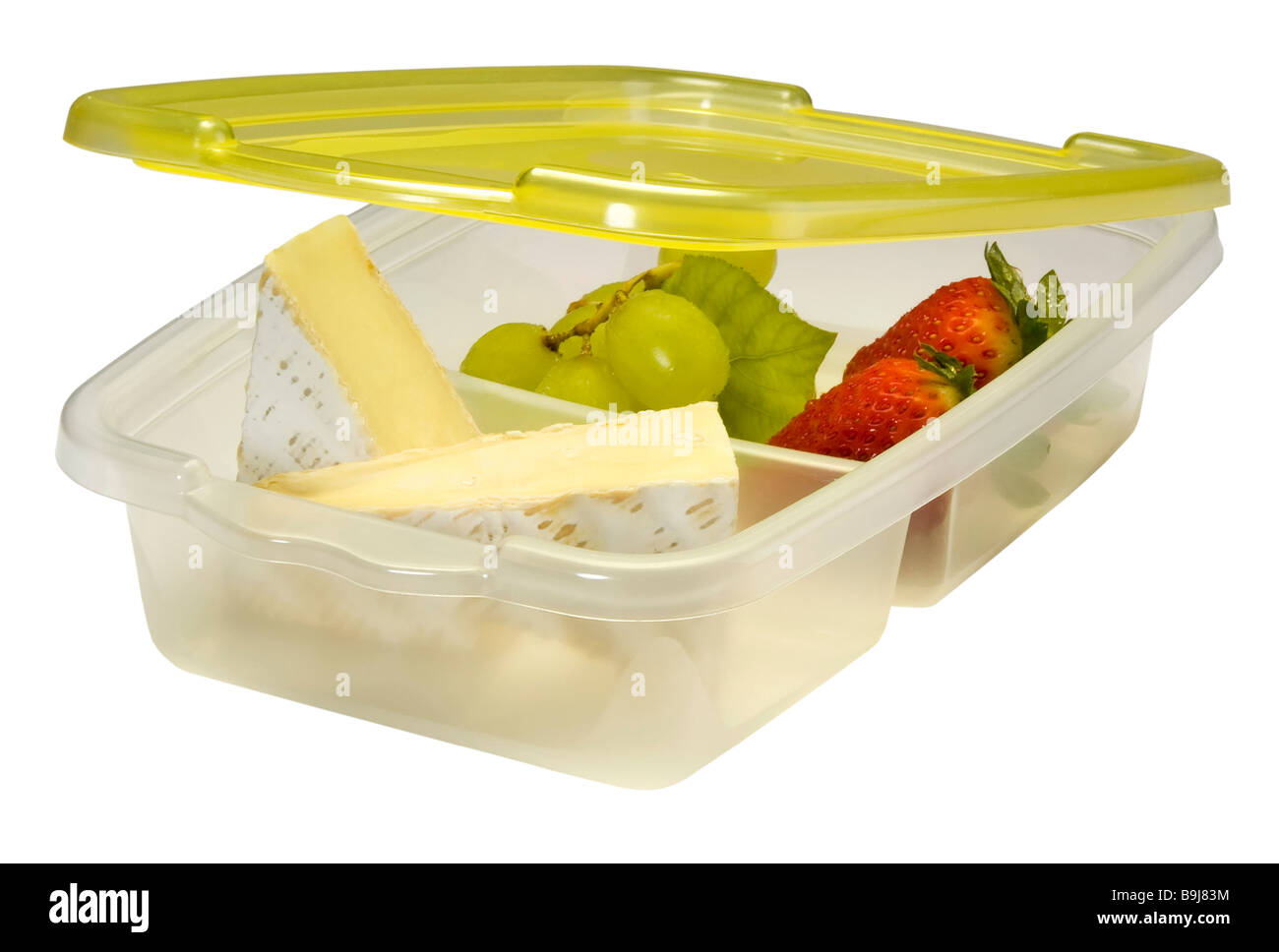Plastic food container with brie cheese and fruits(clipping path Stock ...