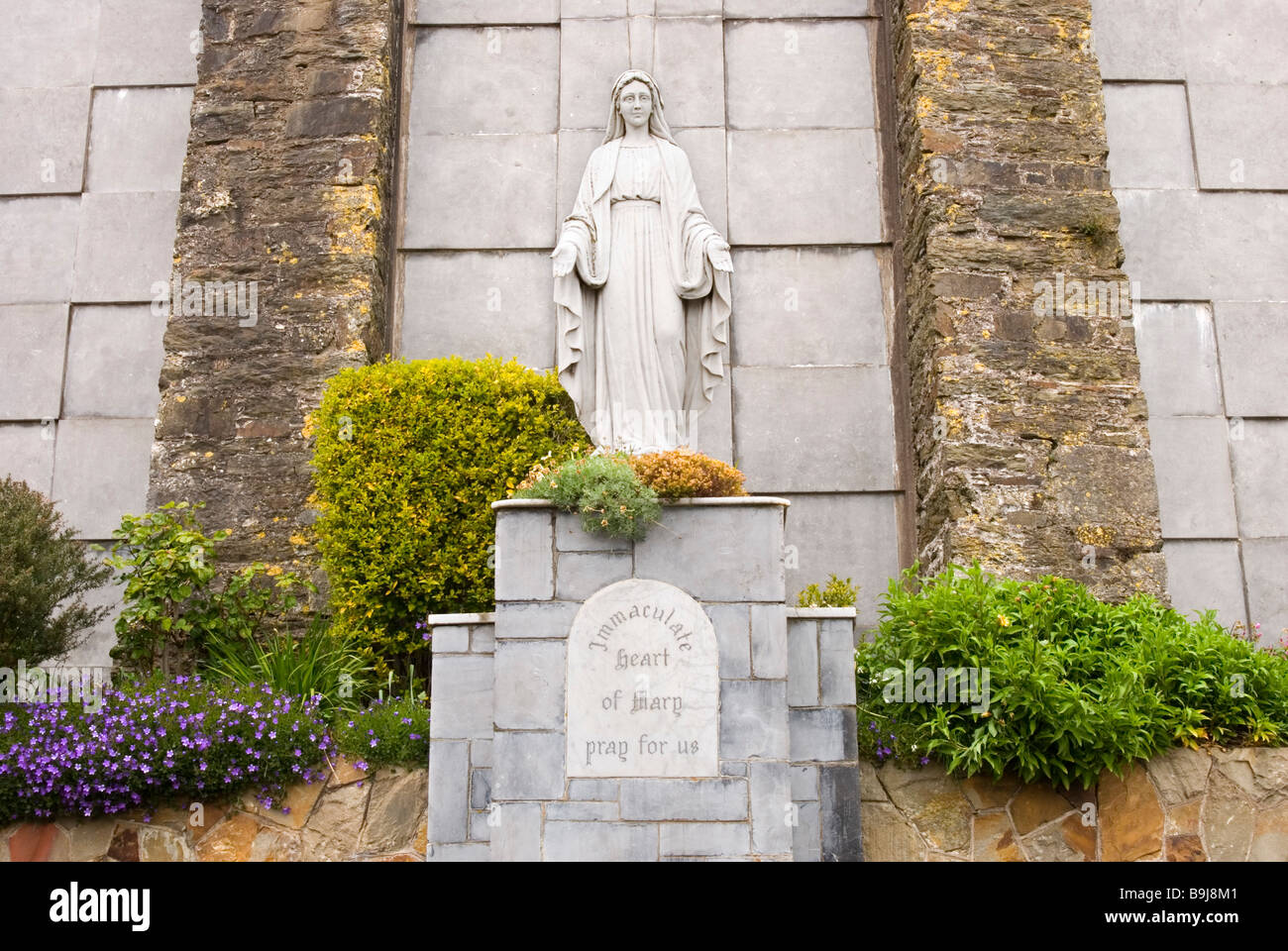 Statue of the Holy Mary on Cobh waterfront, County Cork, Ireland Stock ...