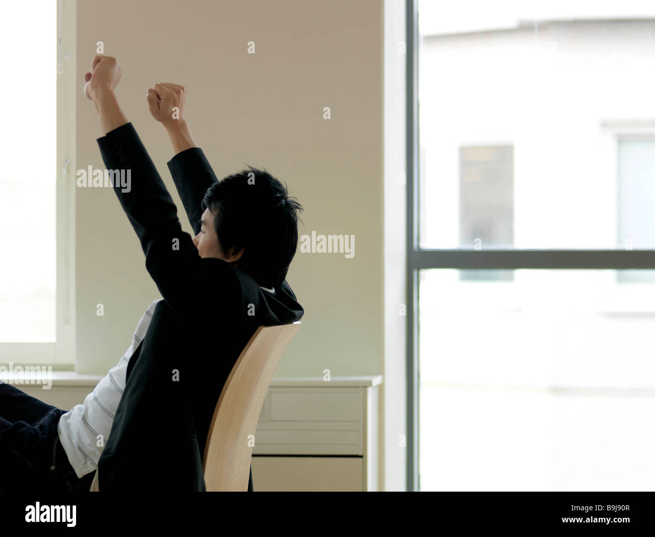 Young business man cheering Stock Photo - Alamy Young business man cheering Stock Photo - Alamy