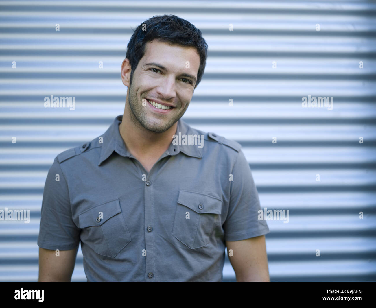 smile man attractively semi-portrait Stock Photo - Alamy