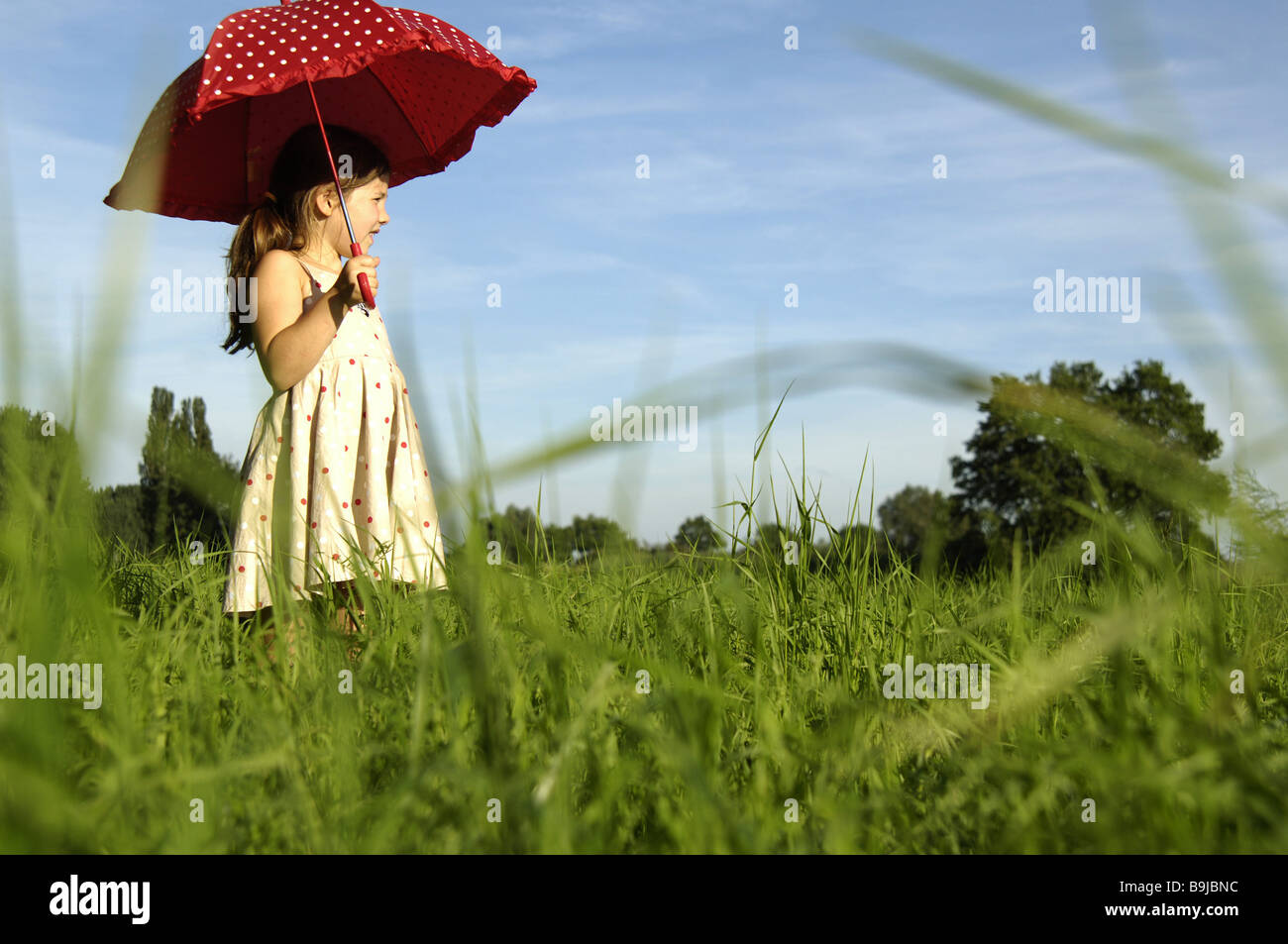 Girl parasol hi-res stock photography and images - Alamy