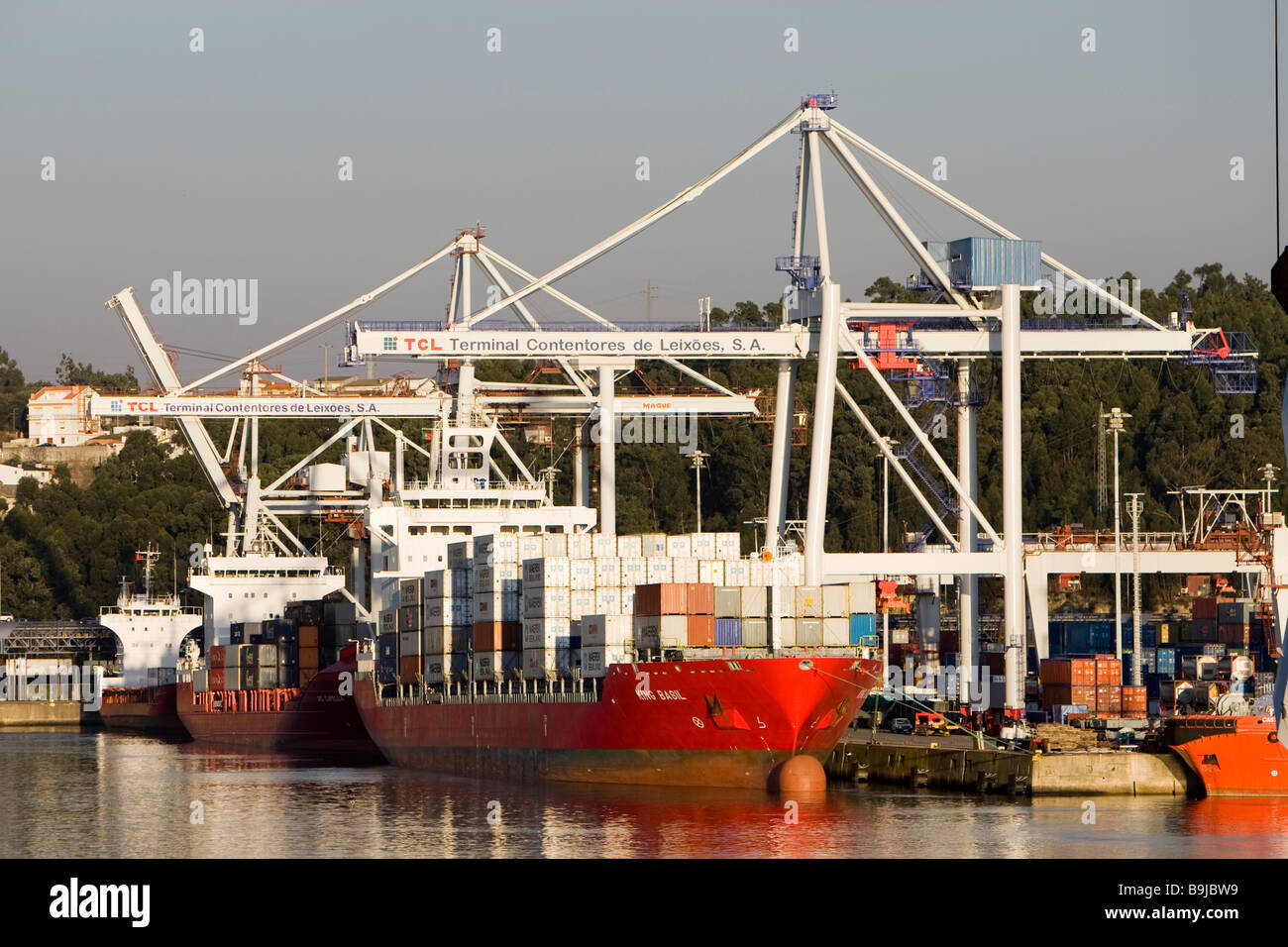 Freighter being loaded with containers at Porto Harbour, Portugal ...