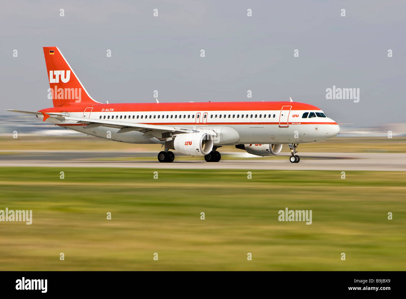 LTU airplane during take-off on the west runway of Frankfurt Airport ...