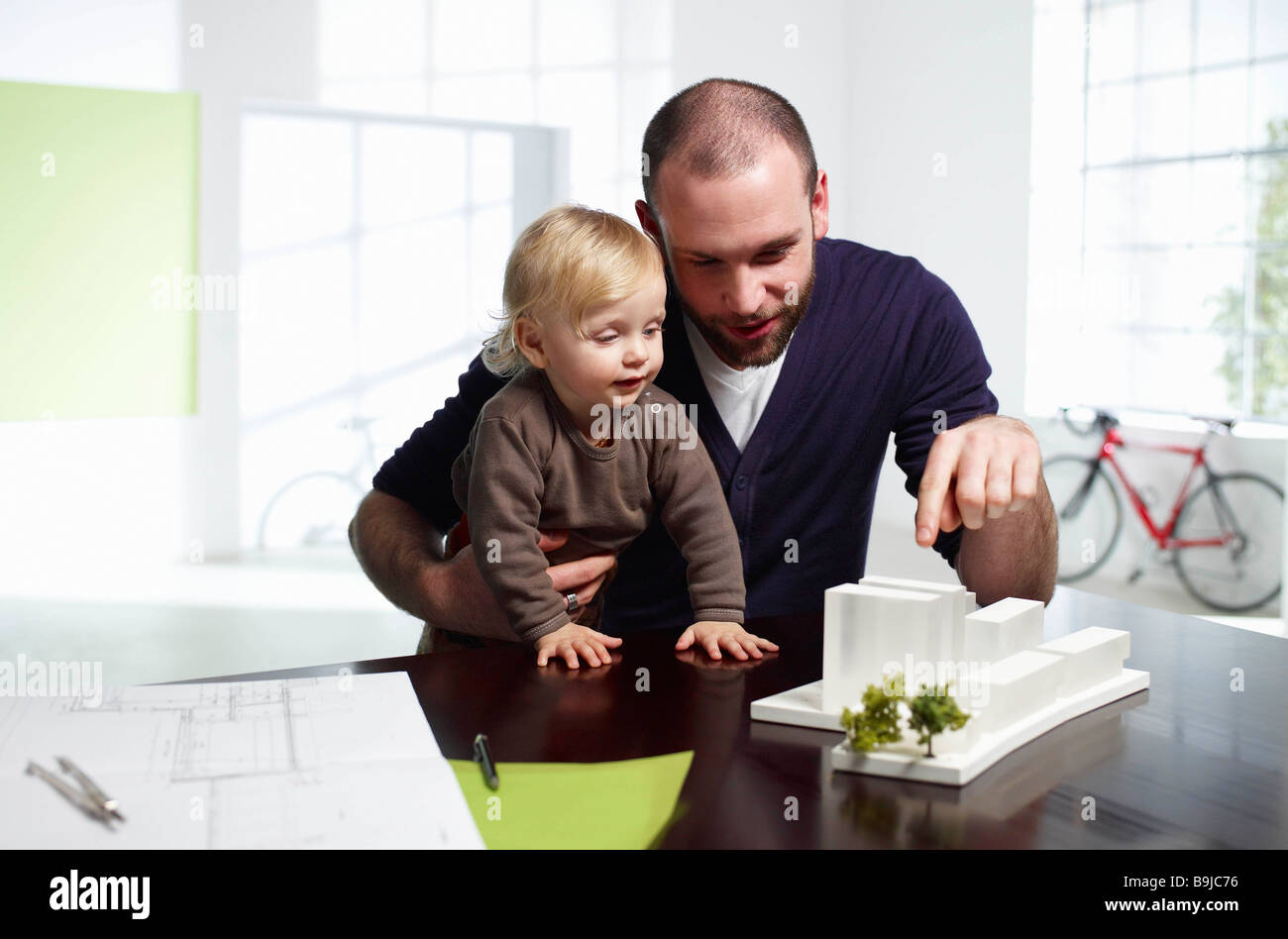 Male architect with baby Stock Photo - Alamy