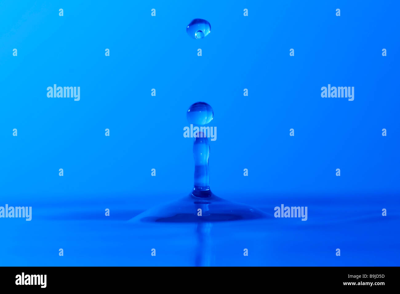 Coloured water drops, blue Stock Photo - Alamy