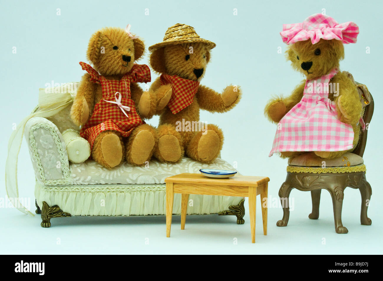 Miniature teddy bear gossiping indoors (Mini Bear Collection Stock ...
