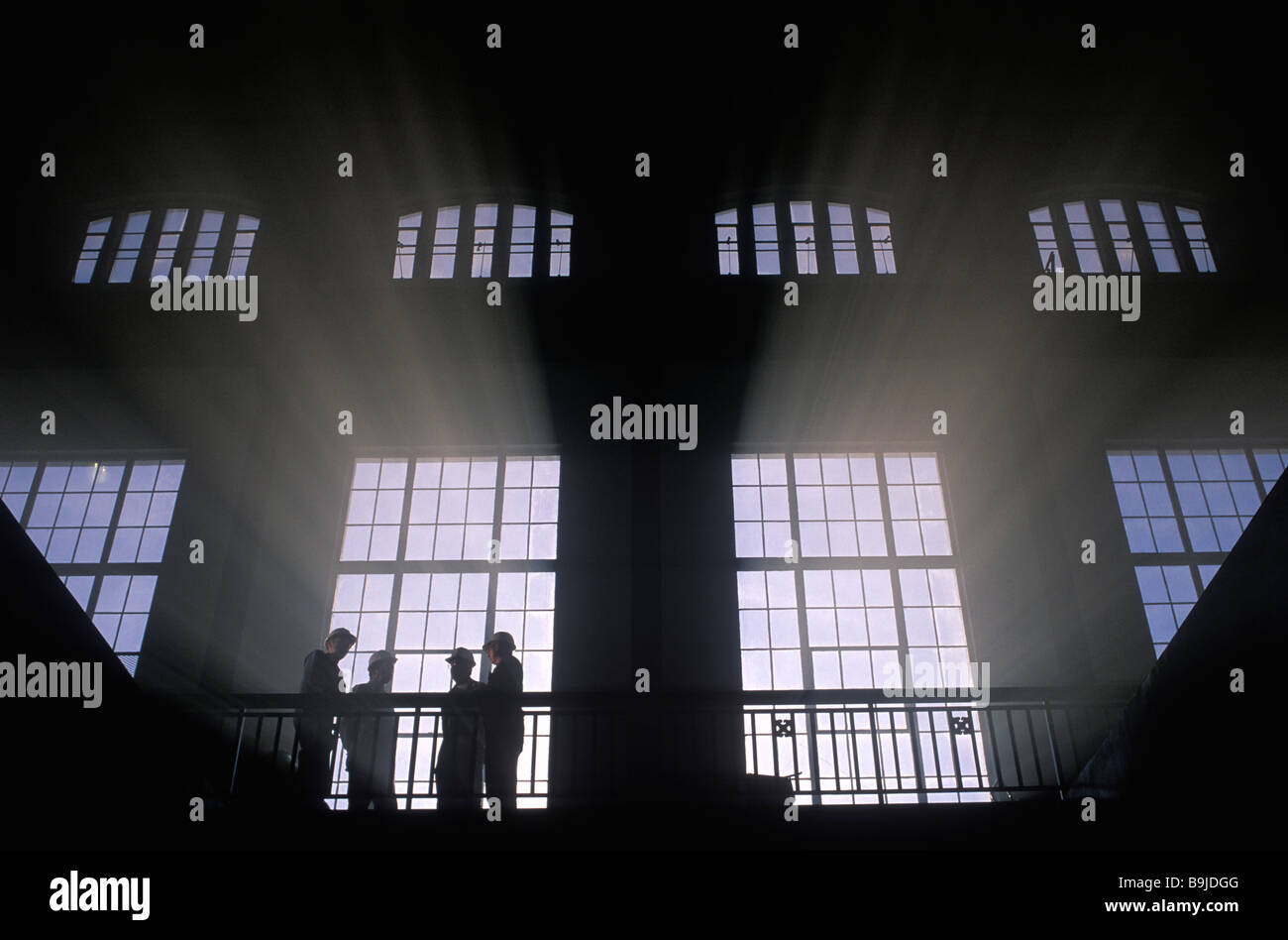 Men meeting in hydroelectric plant, BC Hydro Ruskin Dam power station ...