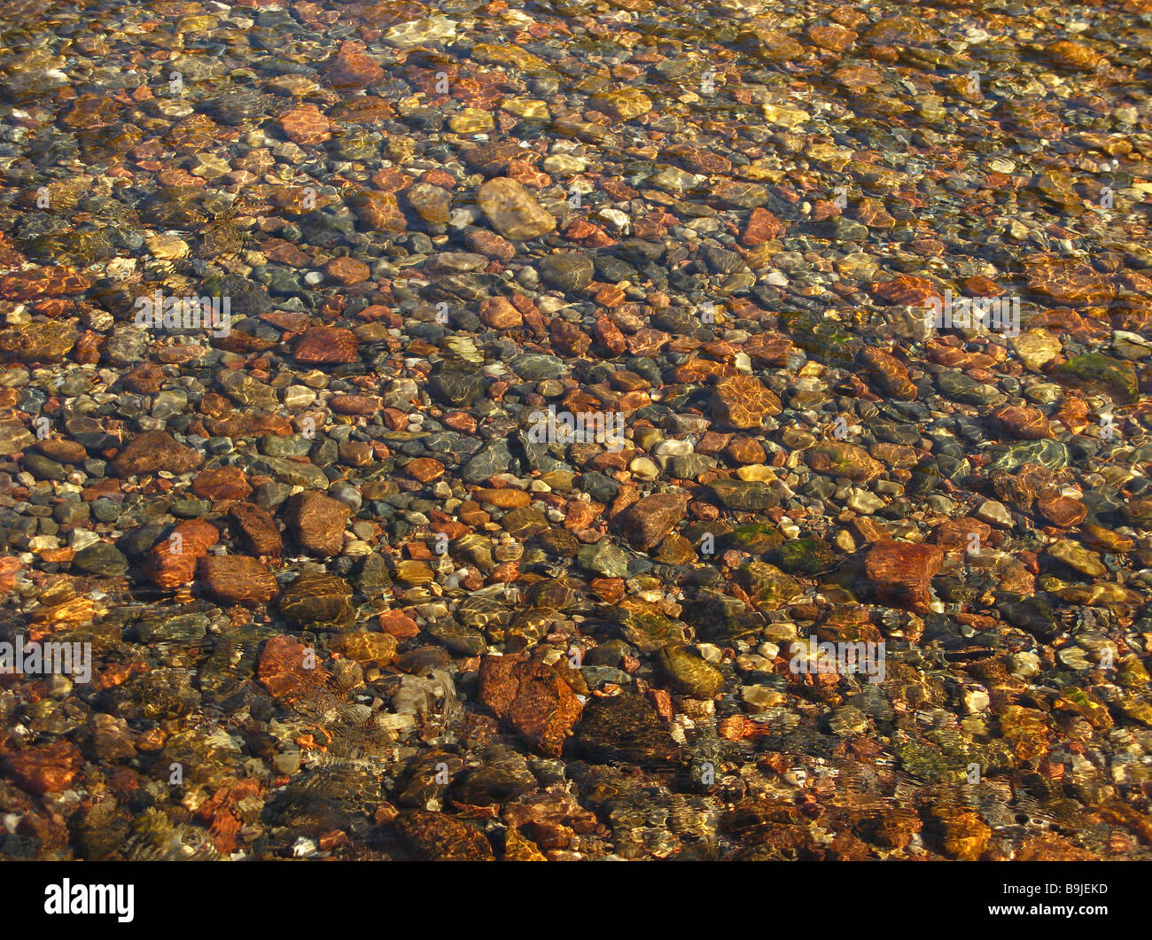 Shallow water over pebbles hi-res stock photography and images - Alamy