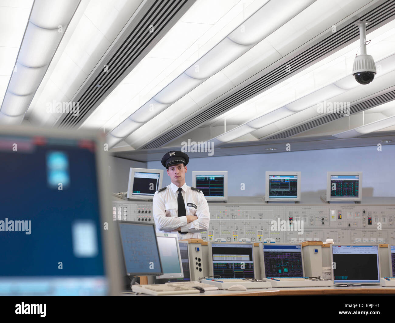 Security guard arms crossed hi-res stock photography and images - Alamy