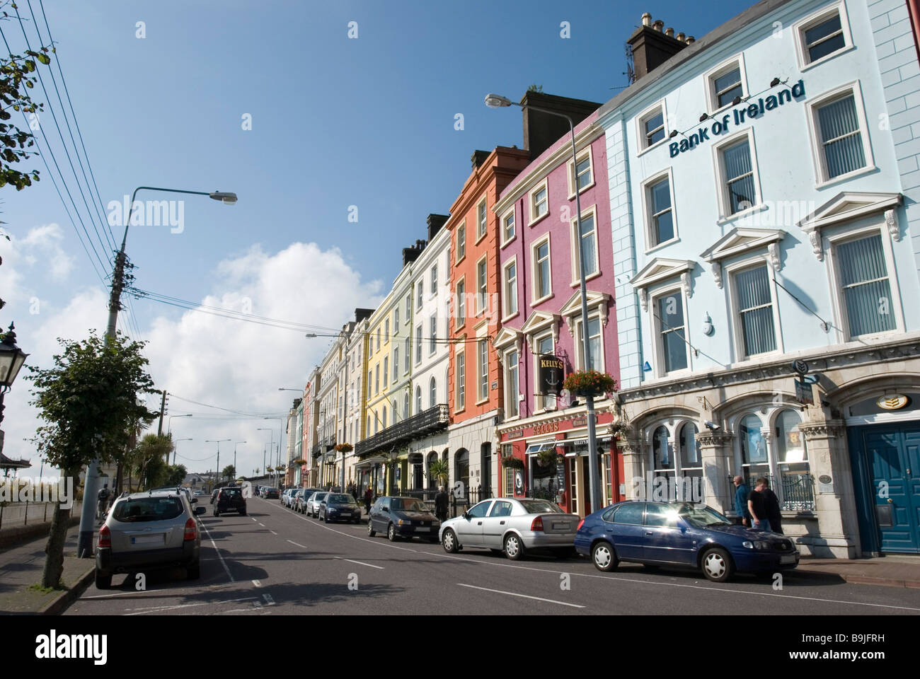 The colourful buildings of Cobh waterfront on a bright sunny day ...