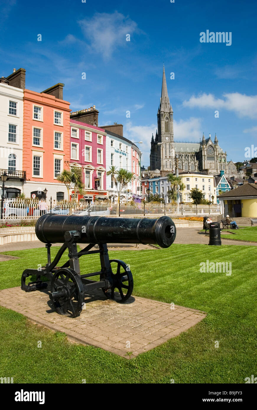 Cannon in Cobh waterfront park with St Colman's Cathedral in the ...
