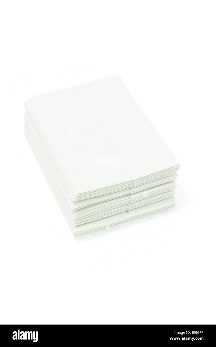 Stack of folded disposable tissue papers on white background Stock ...