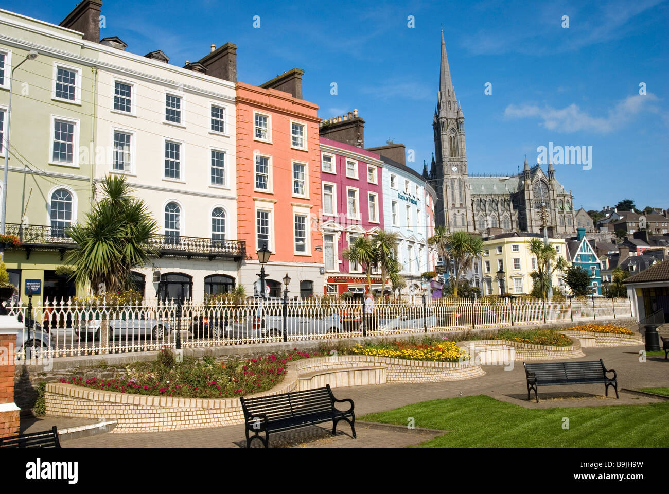 Cobh waterfront park with St Colman's Cathedral in the background on a ...