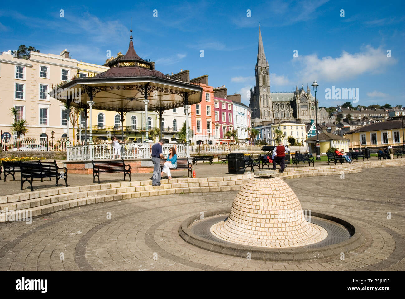 Fountain and band stand in Cobh waterfront park with St Colman's ...