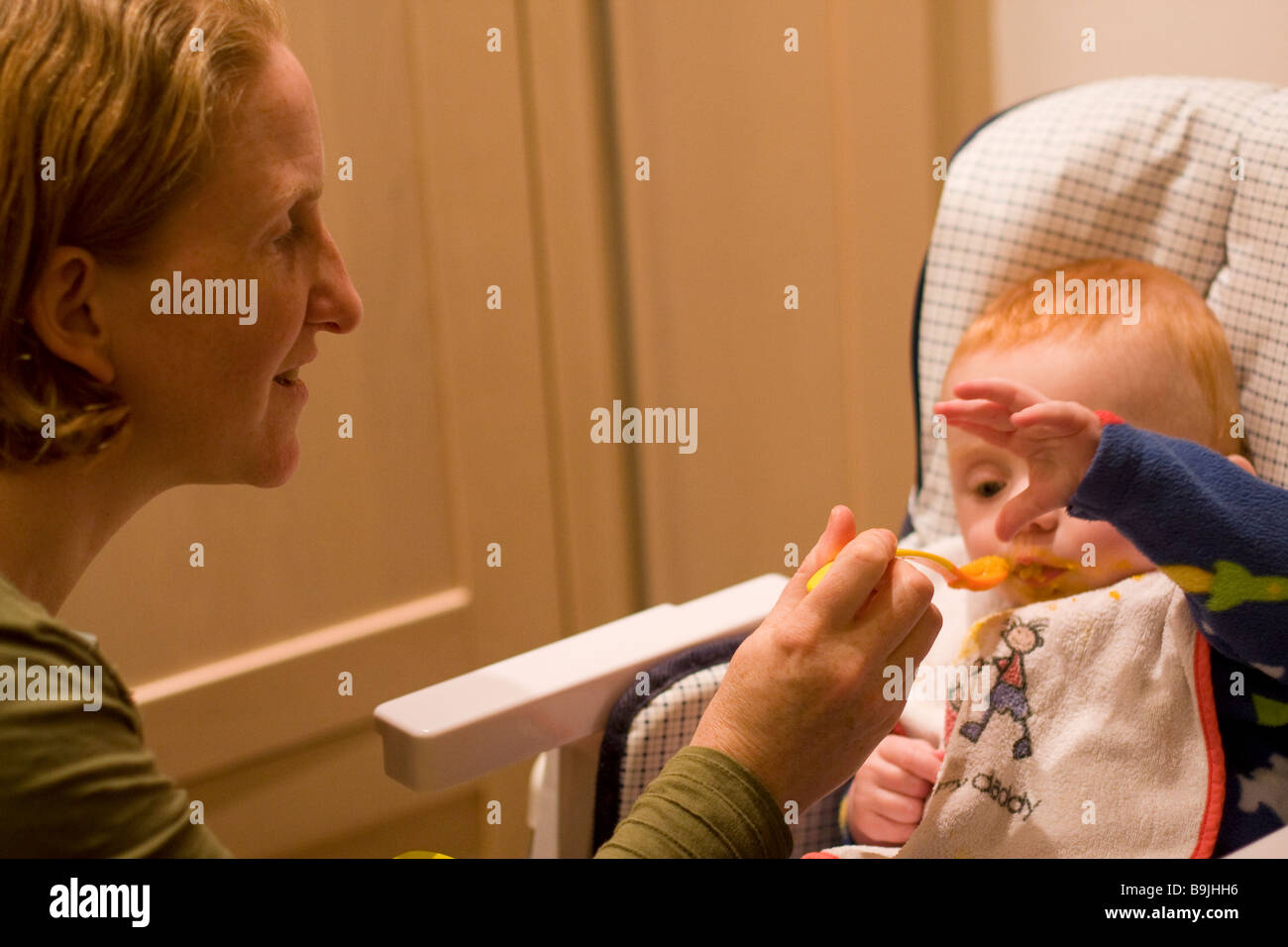 baby boy being fed by mother Stock Photo - Alamy