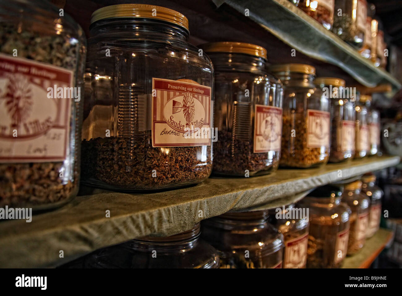 American old store with large glasses jars with dried herbs nobody none ...