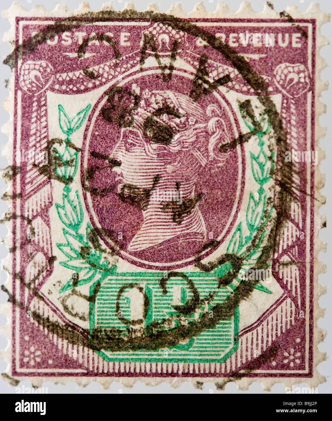 Close up of 1½d, purple and green Victorian British Postal stamp on ...