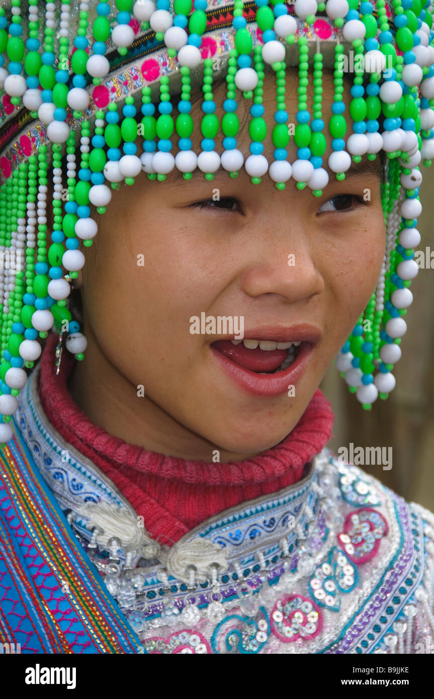 Black Hmong girl with elegant headdress in Sapa Vietnam Stock Photo - Alamy