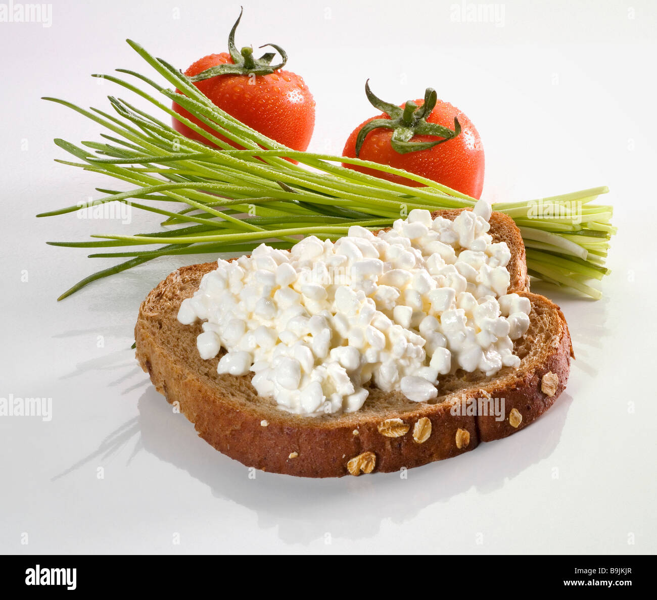 Cottage cheese on a slice of bread Stock Photo - Alamy