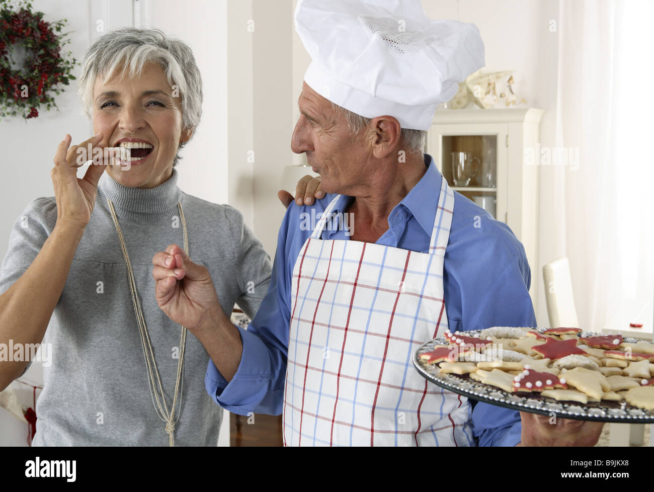 Senior cookie-plate holding woman pastries tries happy 50-60 years 60 ...