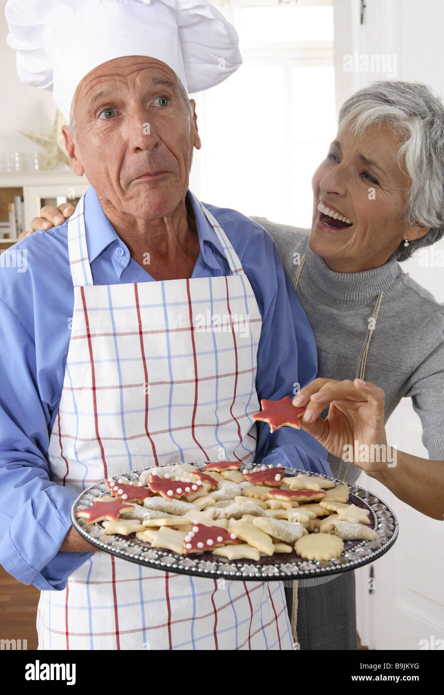 Senior cookie-plate holding woman pastries tries happy 50-60 years 60 ...