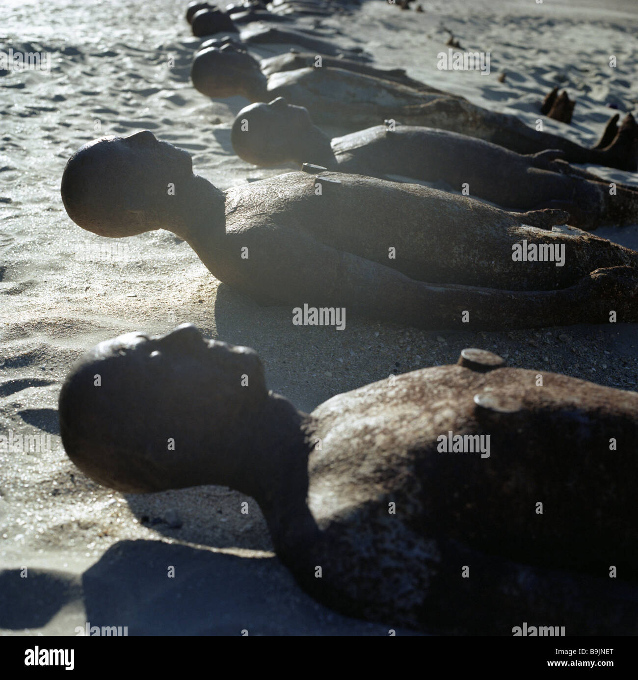 Metal-figures rusty beach lying back light art artwork figures metal ...