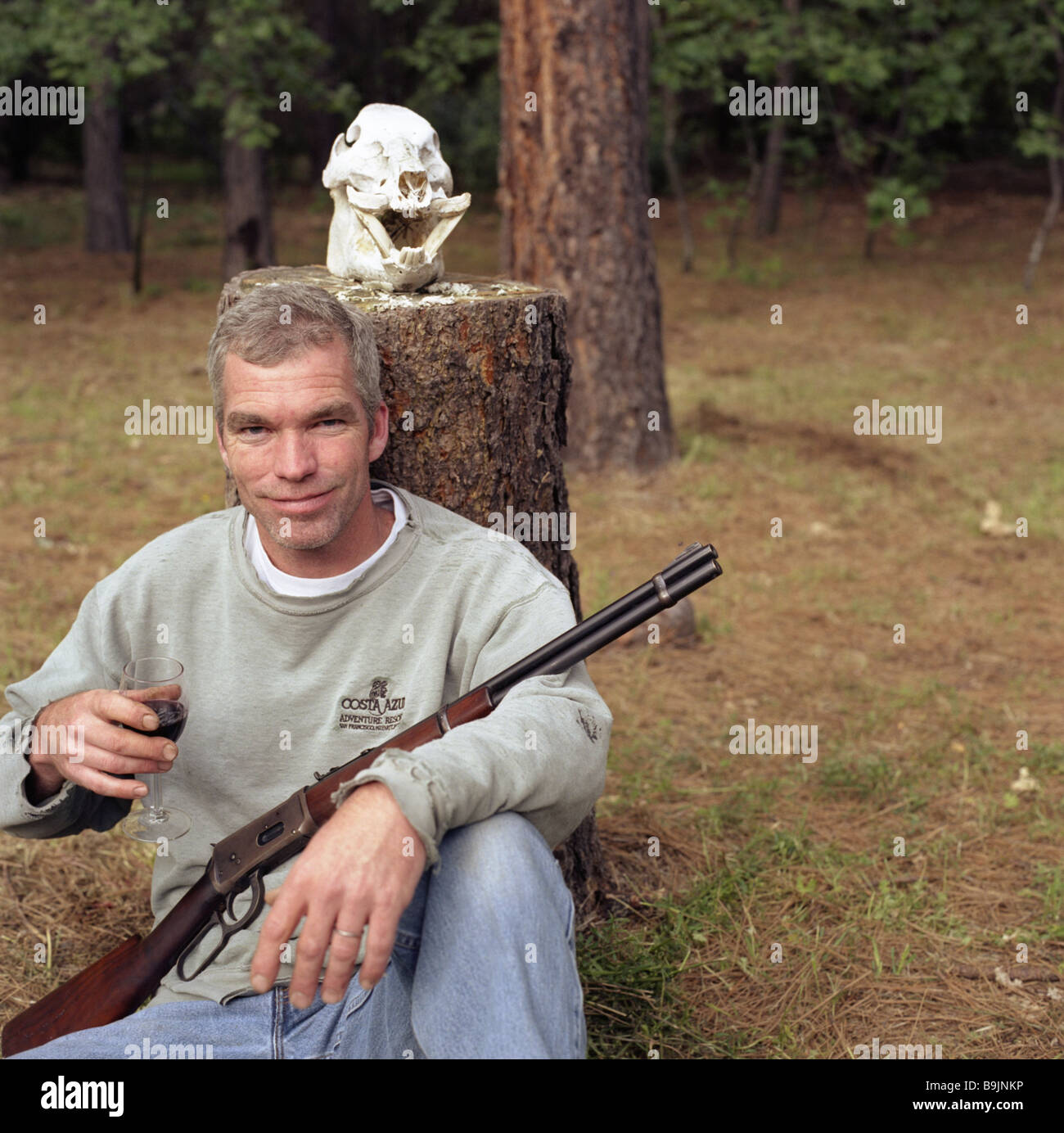 Gun man sit hi-res stock photography and images - Alamy