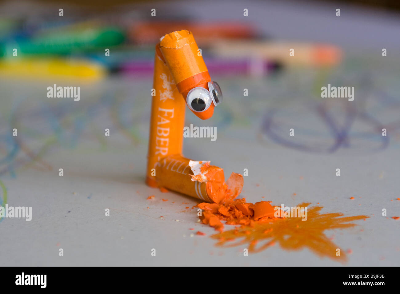 a crayon has come alive and is upset he's been crushed Stock Photo - Alamy