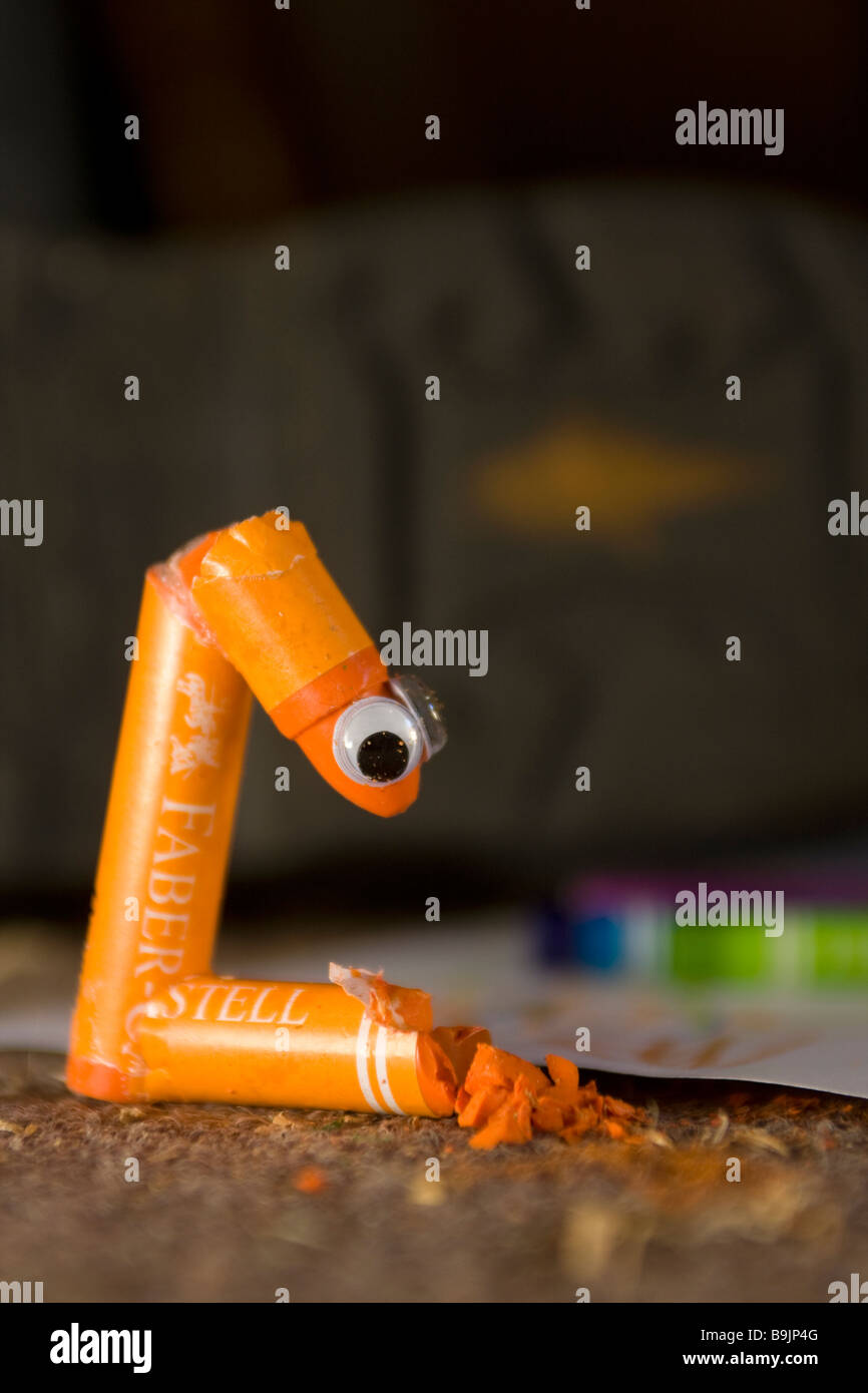 a crayon has come alive and is upset he's been crushed Stock Photo - Alamy