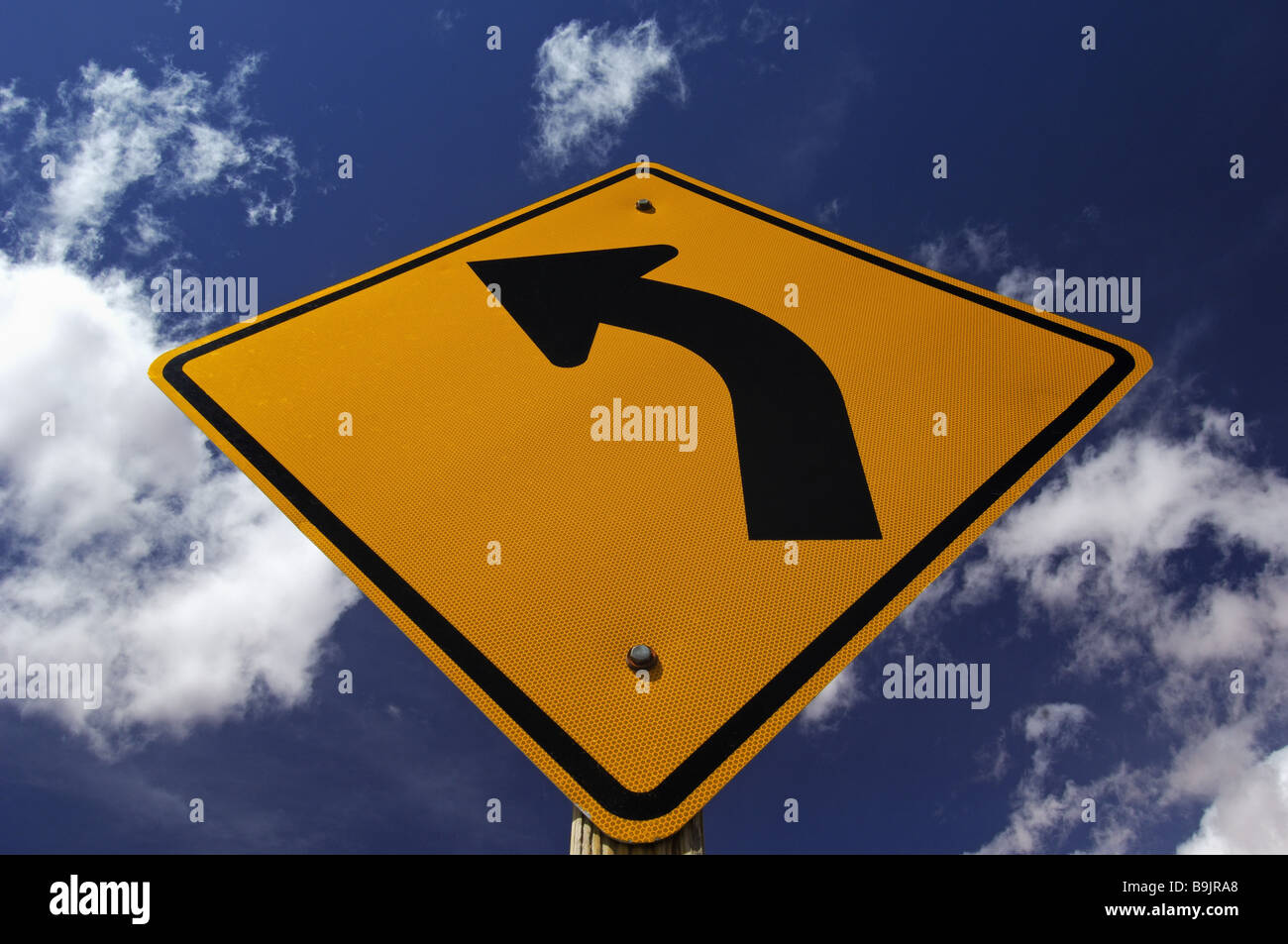 street-sign arrow curve inflection Stock Photo - Alamy