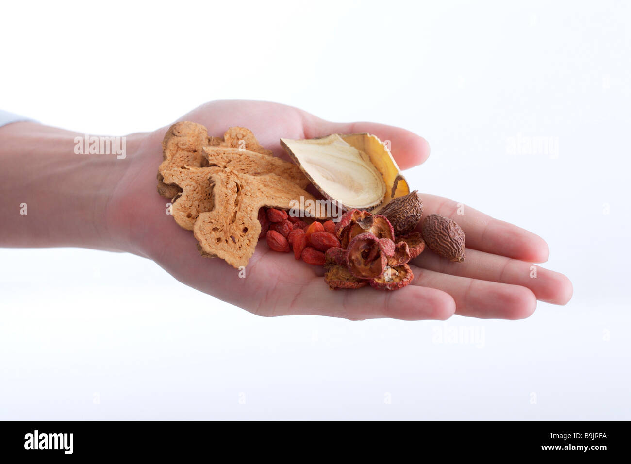 Hand with chinese medicine close up Stock Photo - Alamy