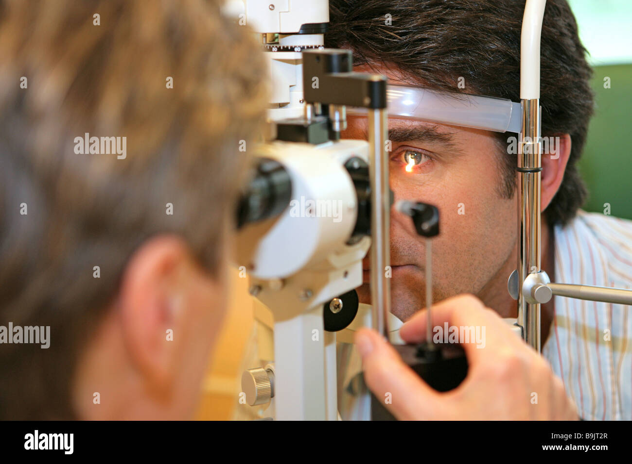 Man eye-diagnosis Doctor's office eye eyes eye specialist eye-diagnosis ...
