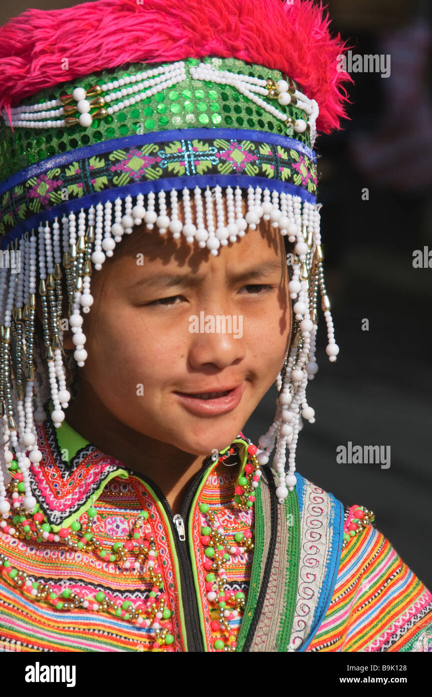 Black Hmong girl with elegant headdress in Sapa Vietnam Stock Photo - Alamy