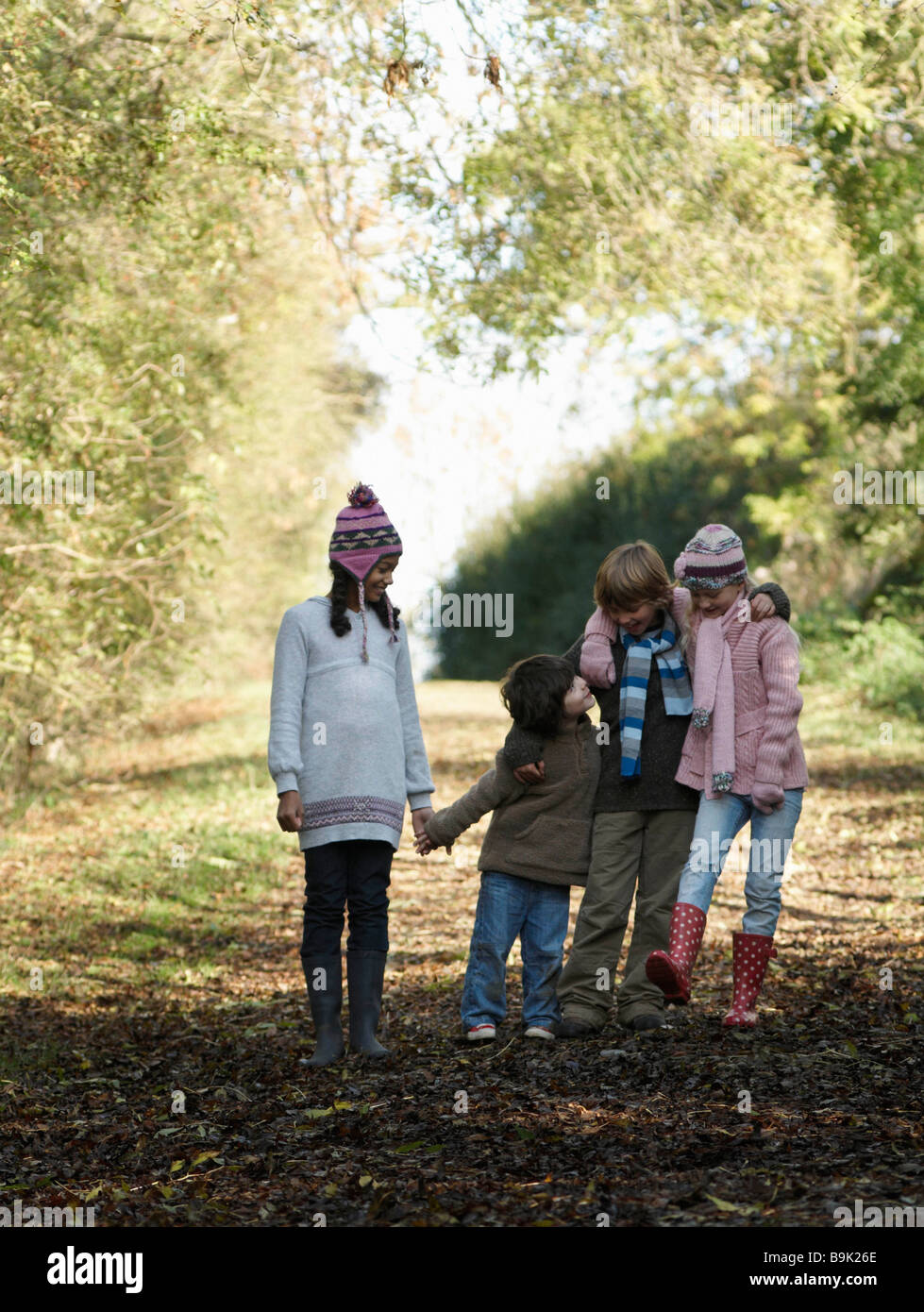 Children chatting on country lane Stock Photo - Alamy