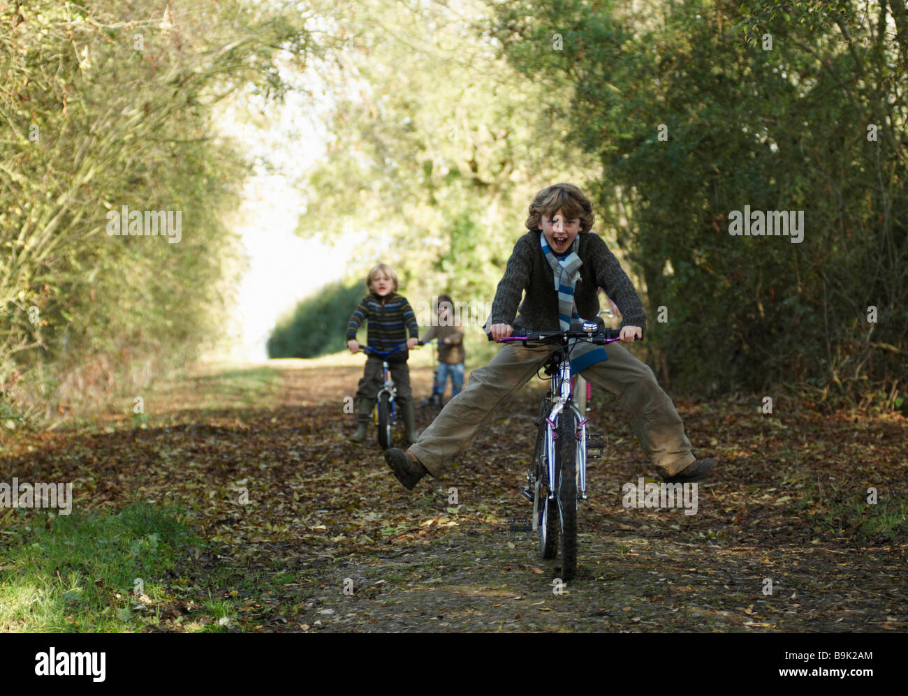 Children riding bikes hi-res stock photography and images - Alamy