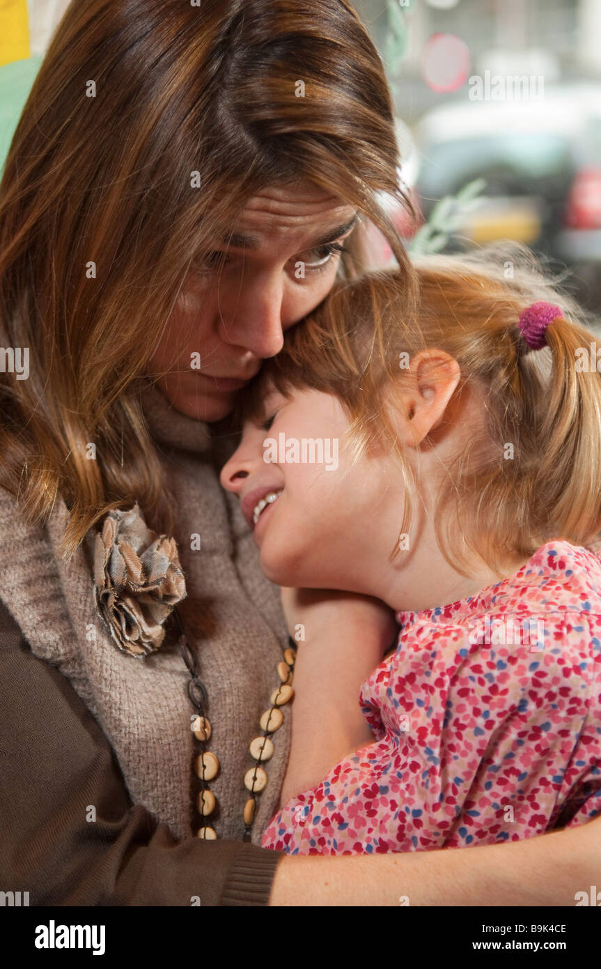 Mother comforting daughter hi-res stock photography and images - Alamy