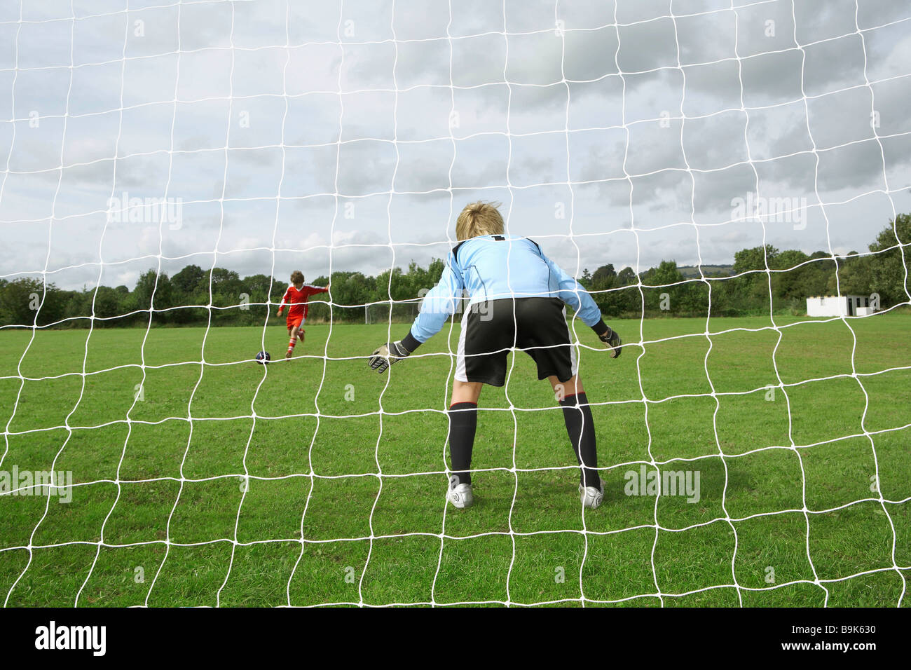 Footballer Kicking Ball High Resolution Stock Photography and Images ...