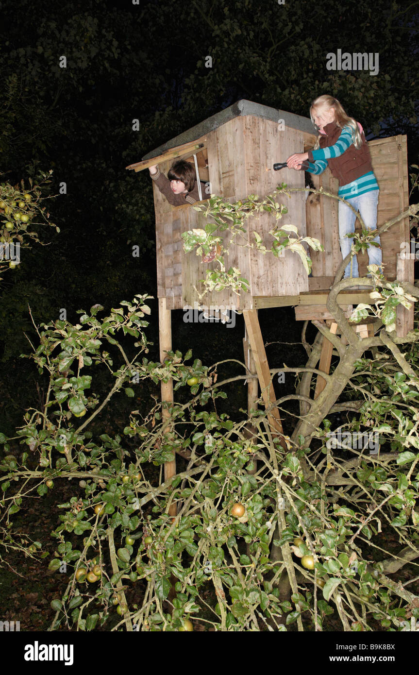 Children in treehouse Stock Photo - Alamy