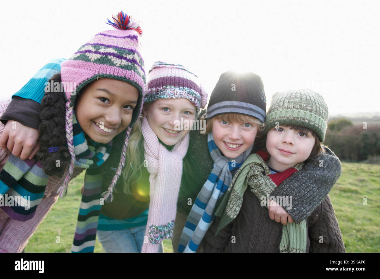 Children playing in field Stock Photo - Alamy