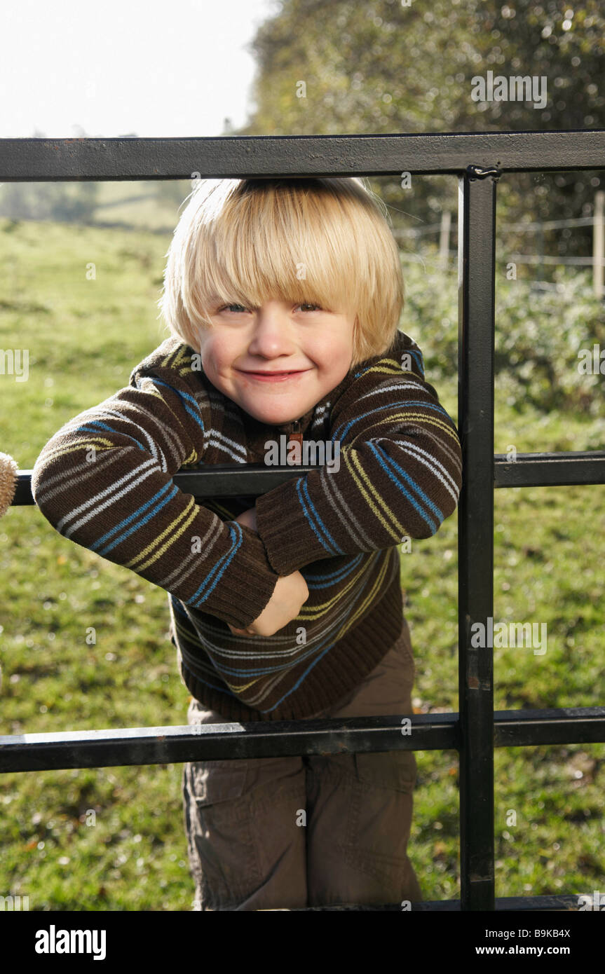 Boy On Gate High Resolution Stock Photography and Images - Alamy