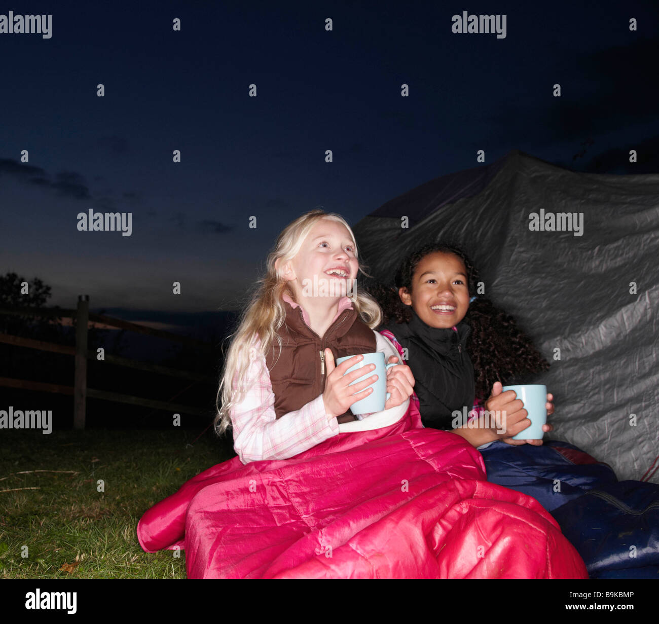 Girls With Hot Drink Near Tent Stock Photo Alamy girls-with-hot-drink-near-tent-stock-photo-alamy