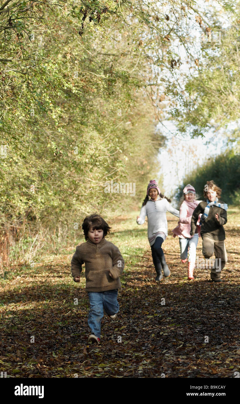 Children running down country lane Stock Photo - Alamy