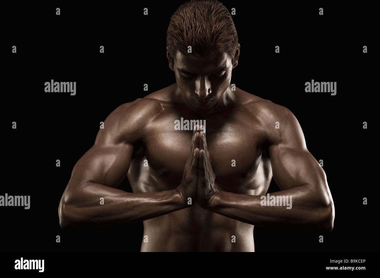 Close-up of a man flexing muscles Stock Photo - Alamy