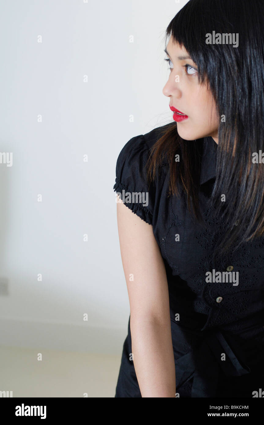 portrait of asian woman looking frightened Stock Photo - Alamy