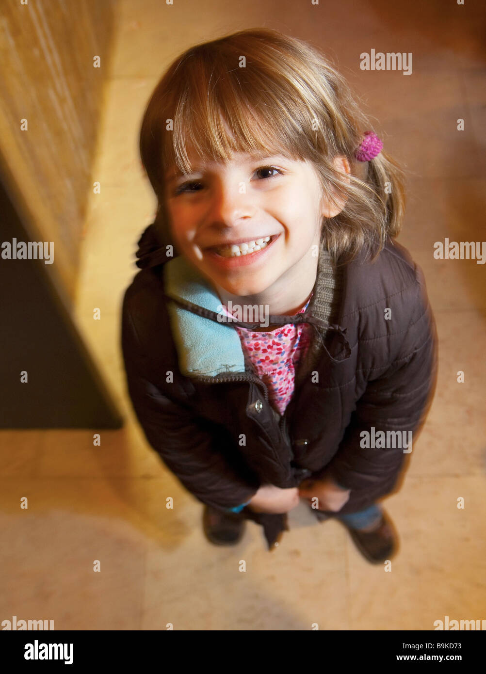 Girl smiling from high angle Stock Photo - Alamy