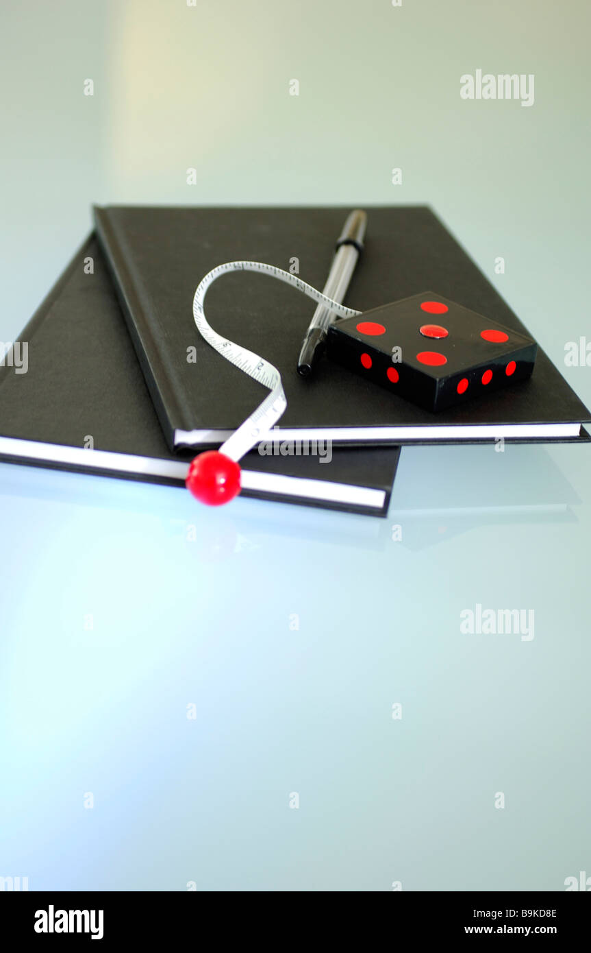 still life of notebooks, pen and tape measure Stock Photo - Alamy